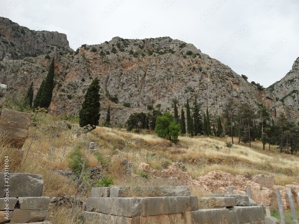 Ruined ancient sanctuary Delphi, also called Python, in Greece in ...
