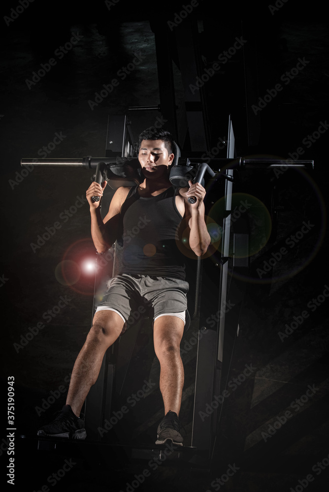 Handsome man doing exercise for buit muscle,fit and firm body,Lens ...