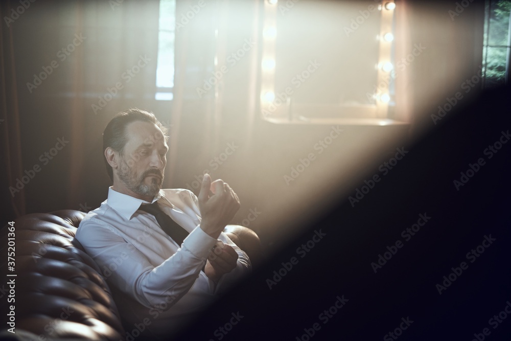 cinematic photo shoot of the confident actor celebrity look in foggy ...
