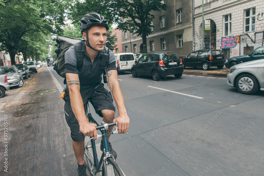 Bicycle Messenger Stock Photo | Adobe Stock