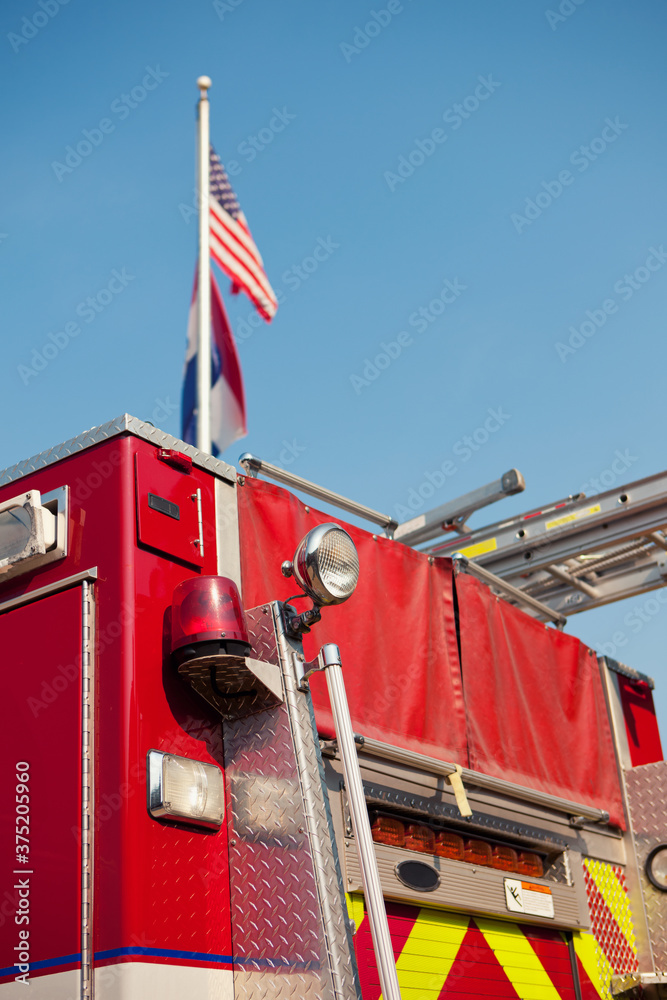 Firehouse: Fire Truck with American Flag Stock Photo | Adobe Stock