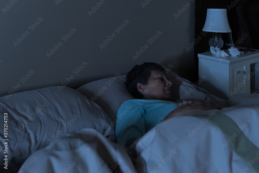 Sleeping in Bed at Night Stock Photo | Adobe Stock