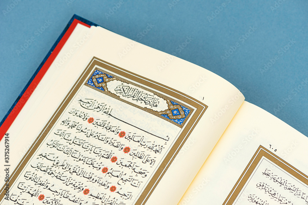 Holy quran, Islamic book, close-up detail. Stock Photo | Adobe Stock
