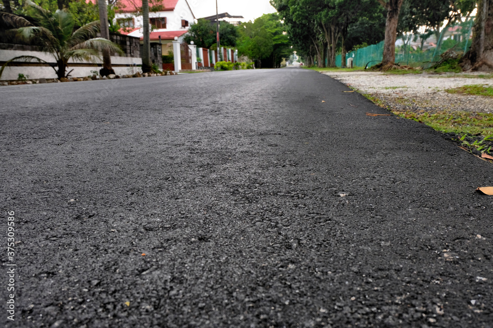 Foto Stock Smooth surface of a new tar road. Freshly laid tar to fill ...