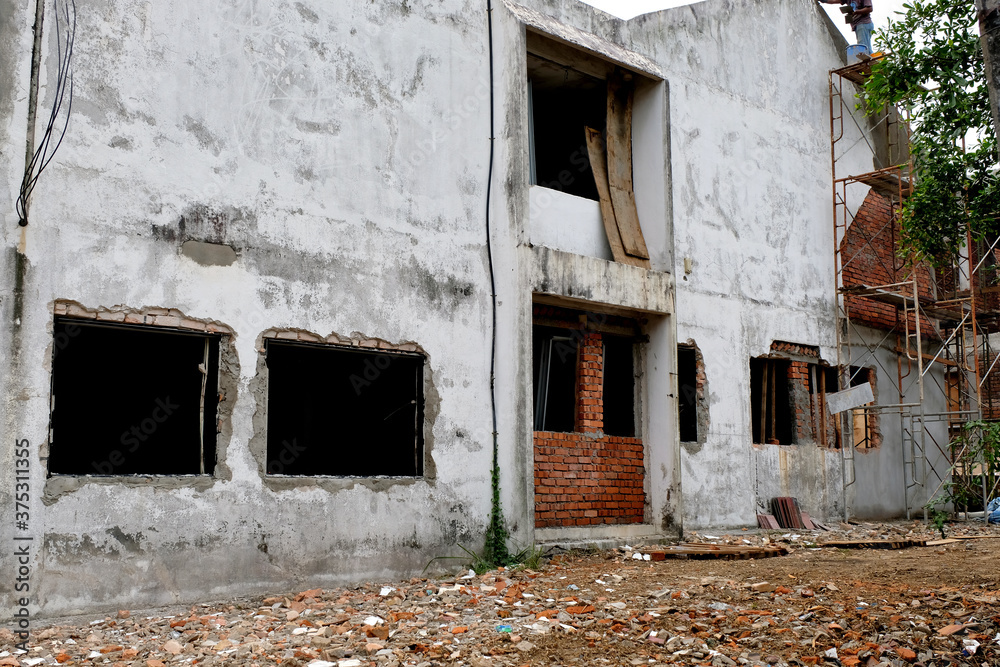 A house looking run down and dilapidated with heavy renovation ...