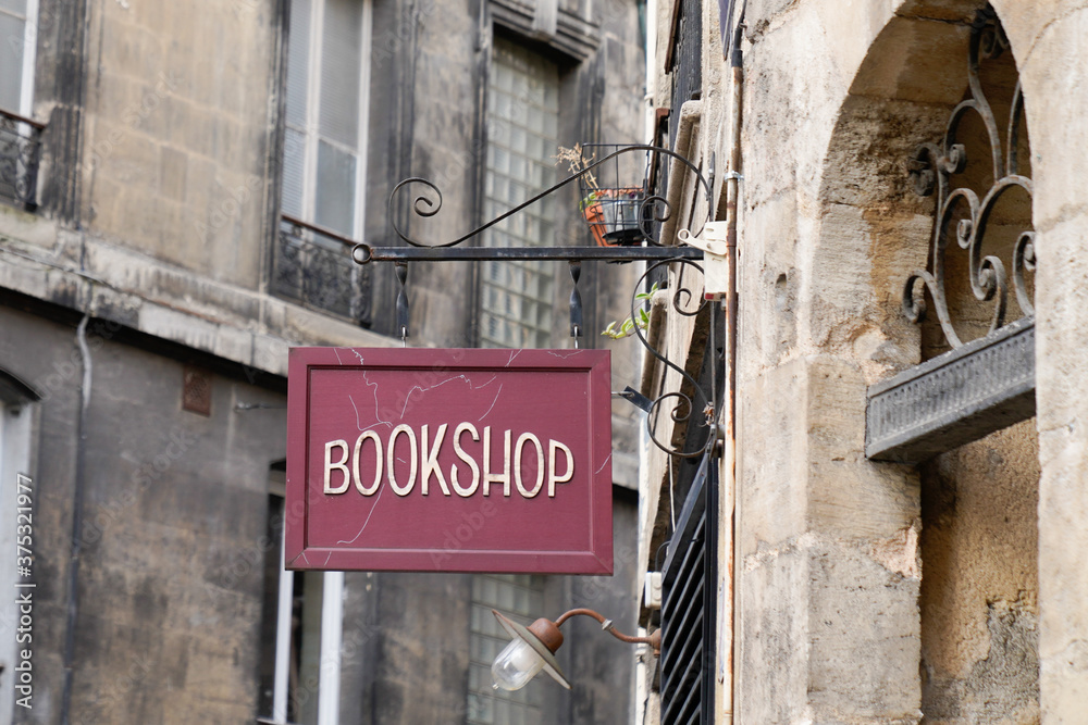 bookshop sign on steel plate vintage signage of bookstore in city ...