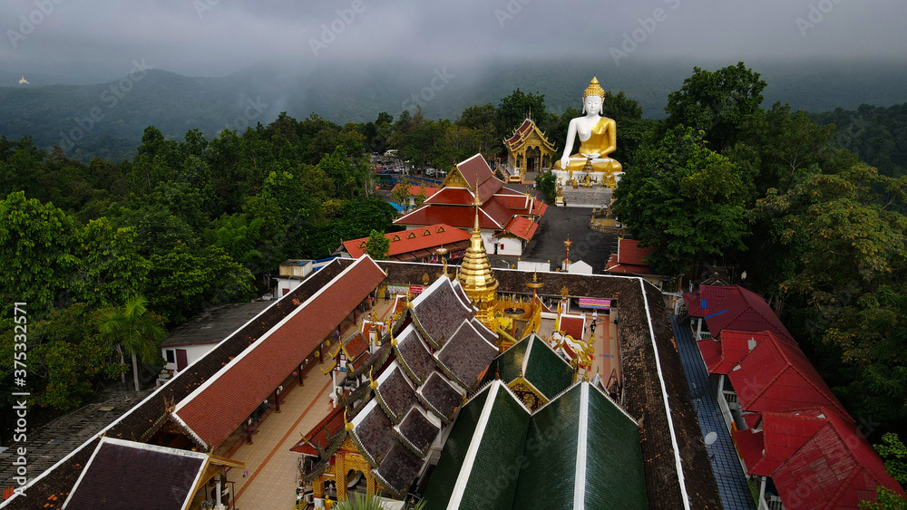 What Phra That Doi Kham literally means "Temple of the Golden Mountain ...