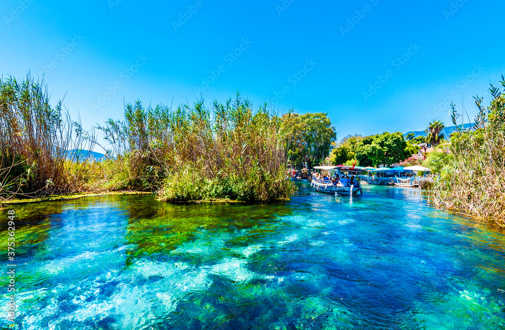 Taking tour on Azmak Stream in Akyaka Village. Akyaka is popular ...