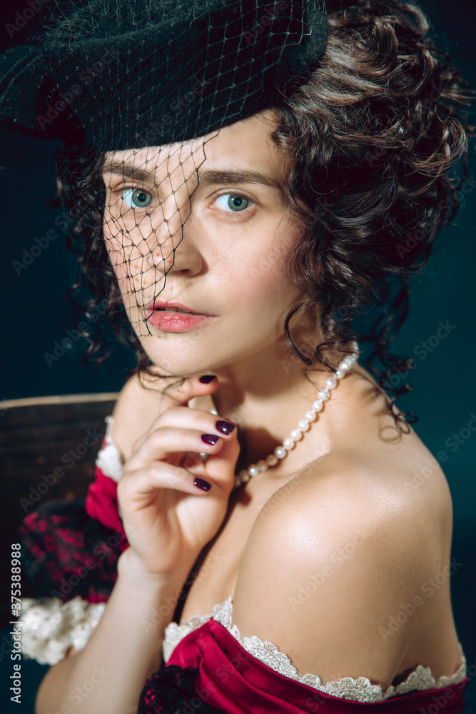 Love tragic. Young woman as Anna Karenina isolated on dark blue ...
