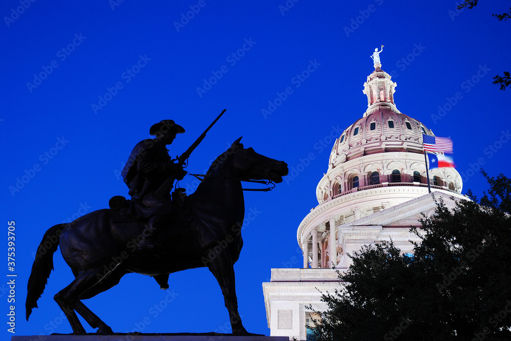 The Texas Ranger Memorial stands guard at the Texas State Capitol in ...
