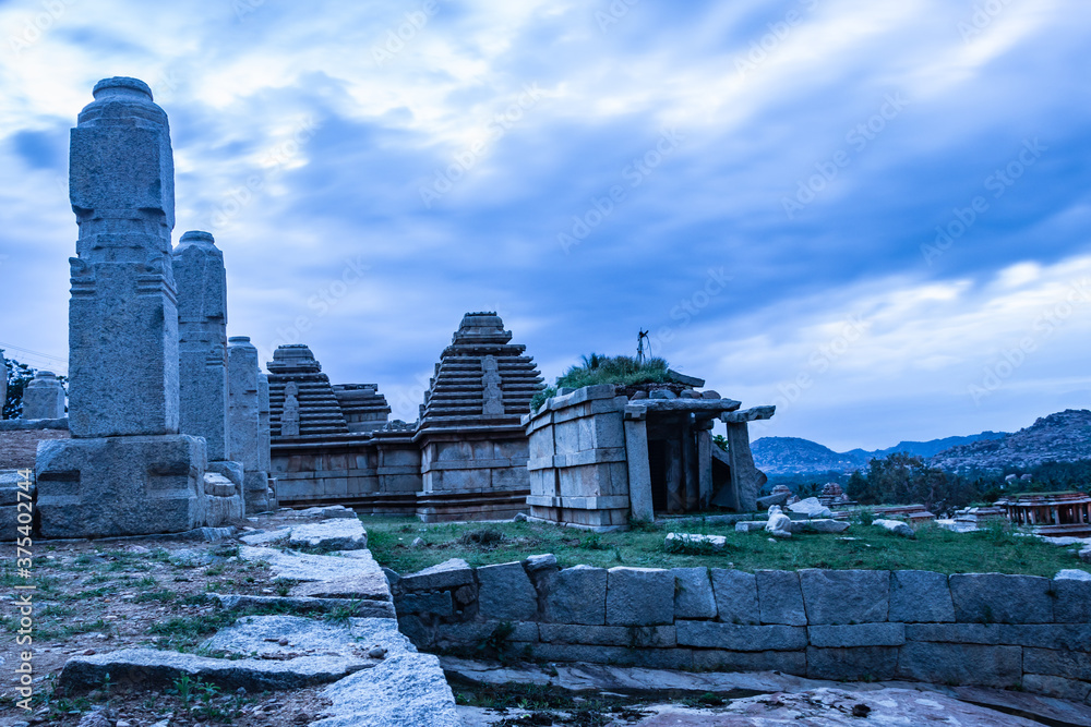 hampi ruins ancient stone art with dramatic sky flat angle shot Stock ...