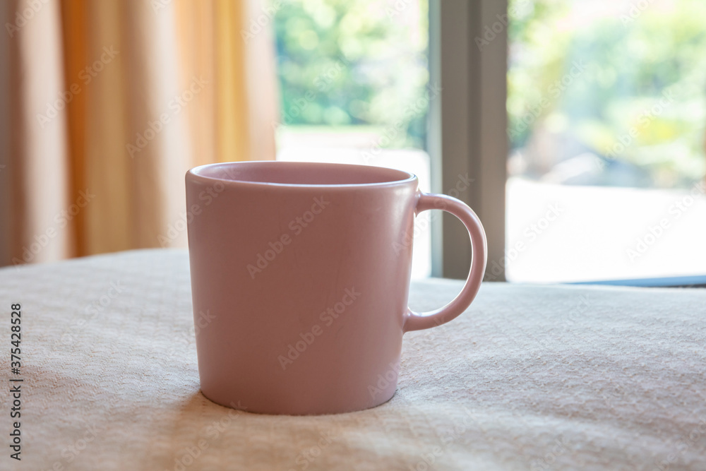 Coffee mug pink color on pastel blue background. Hot beverage cup ...