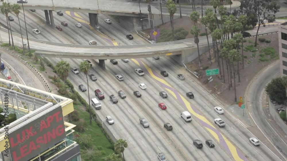 Overhead Shot Following Cars Moving Through Freeways in Downtown LA ...
