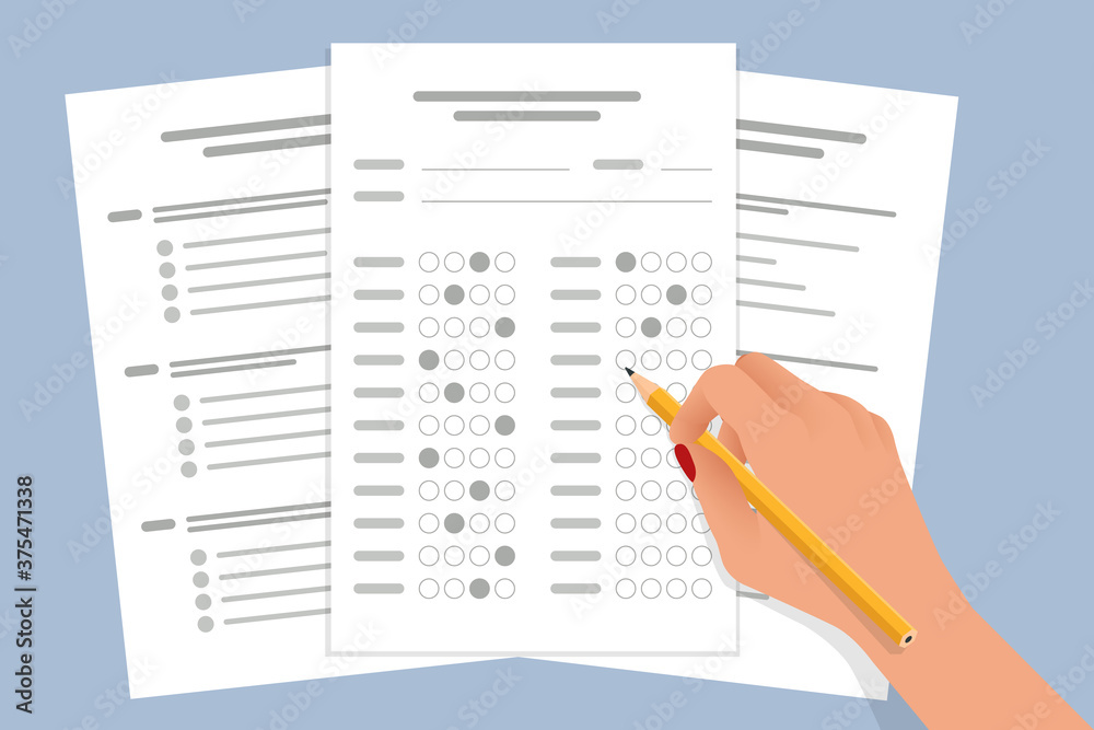 The student filling out answers to exam test answer sheet with a pencil ...