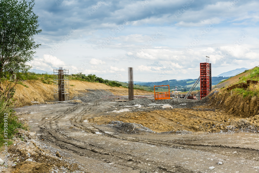 Construction of bridge pillars for new freeway Stock Photo | Adobe Stock