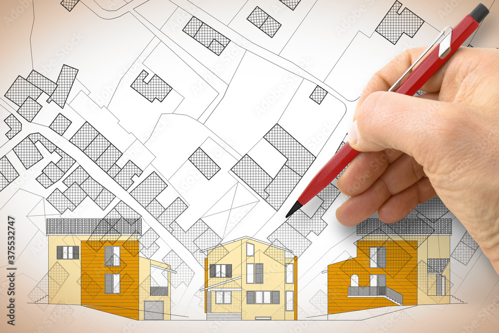 Architect drawing a new residential building over an imaginary ...