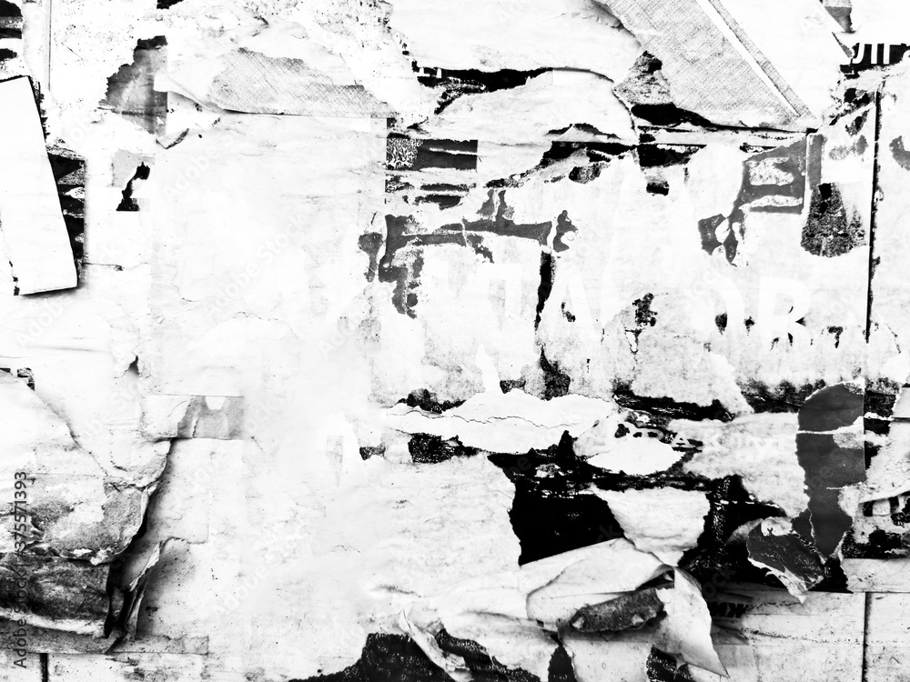 Layers of vintage posters glued and torn with time to the wall Stock ...