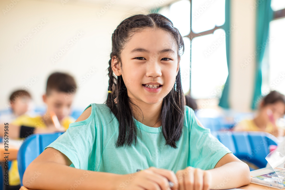 beautiful asian little girl studying in the classroom. Stock Photo ...
