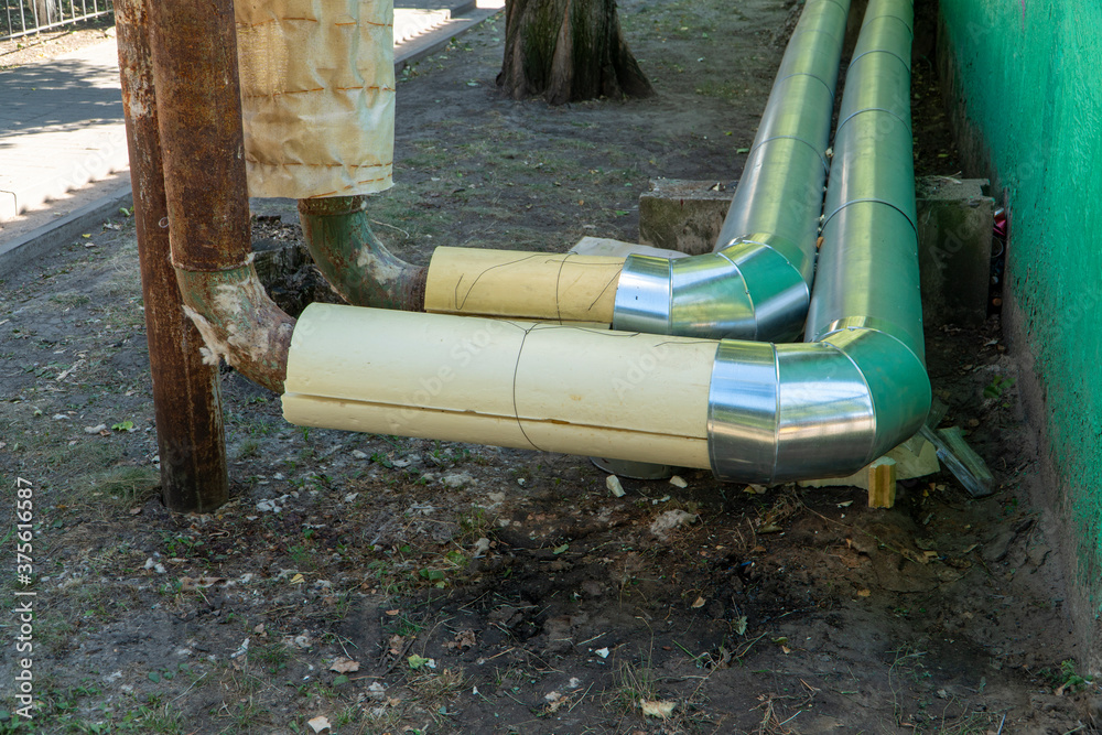 Replacement of supply and return pipes insulation by modern shells ...