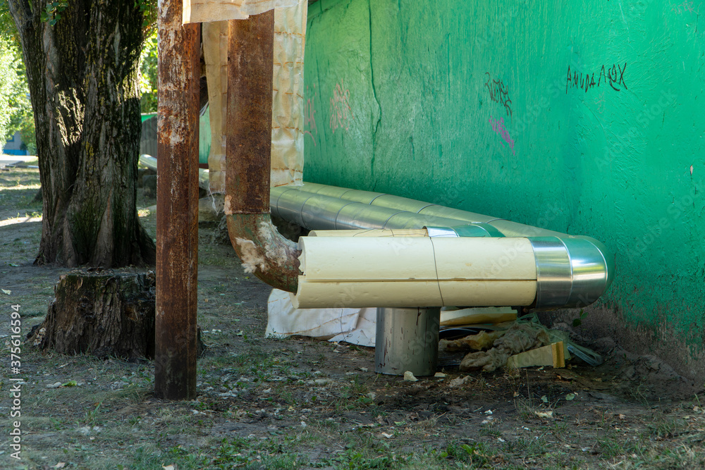 Heating network pipe Insulation renovation by half-shells and metal ...