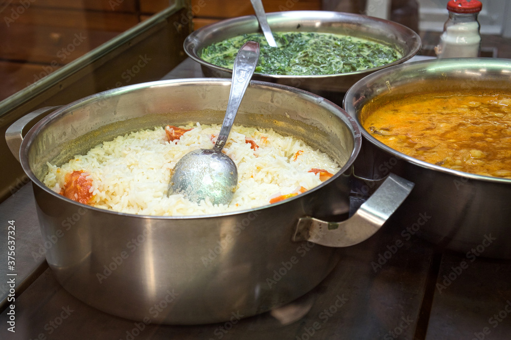 The chef in the kitchen of the restaurant cooking traditional Bosnian ...