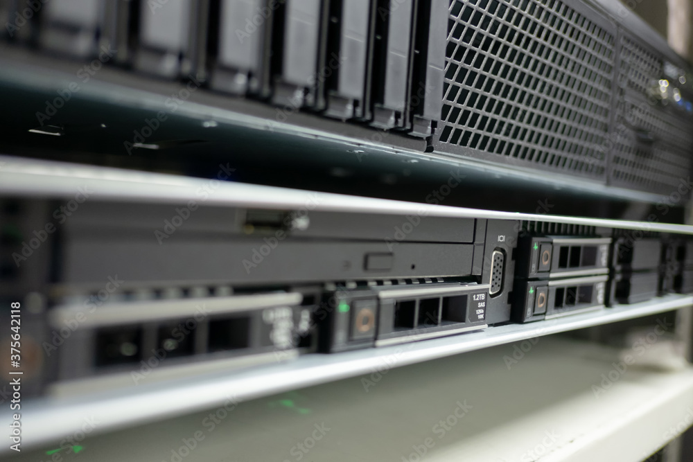 The system administrator works in the server room of the data center ...