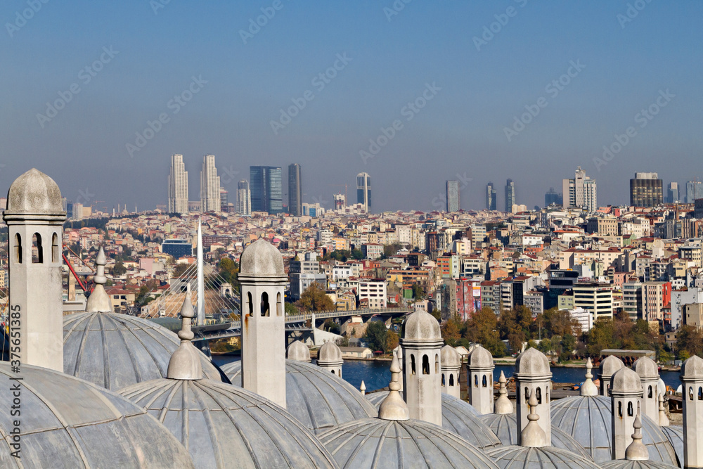 Bosphorus through the chimneys and domes of the ancient ottoman madrasa ...