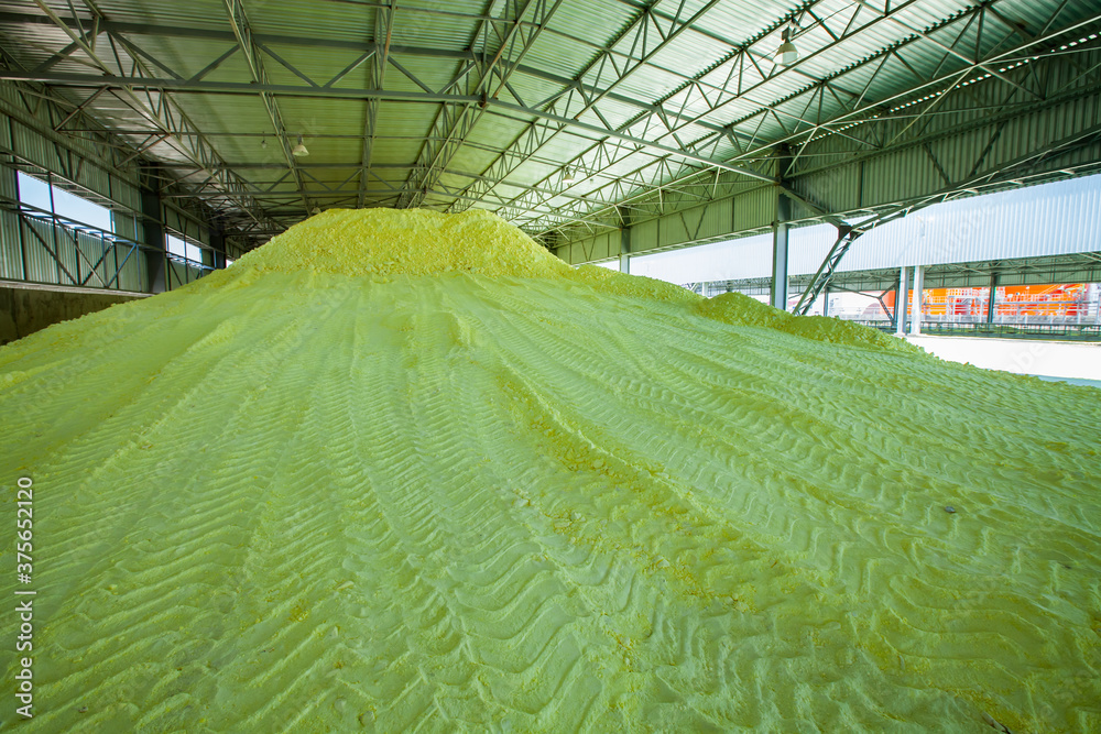 Big yellow sulfur heap at sulfuric acid factory warehouse Stock Photo ...