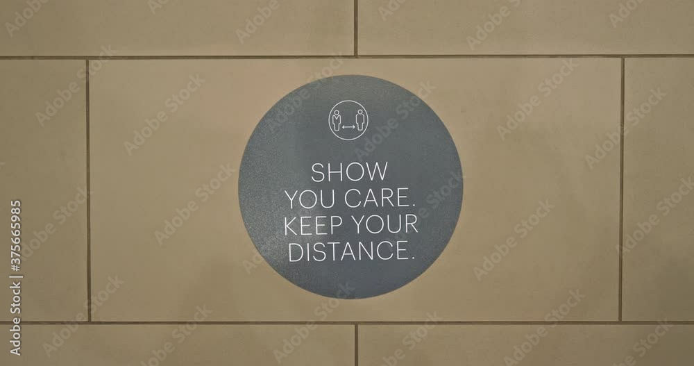 Hotel floor decal reminds travelers to keep 6 feet apart from each ...