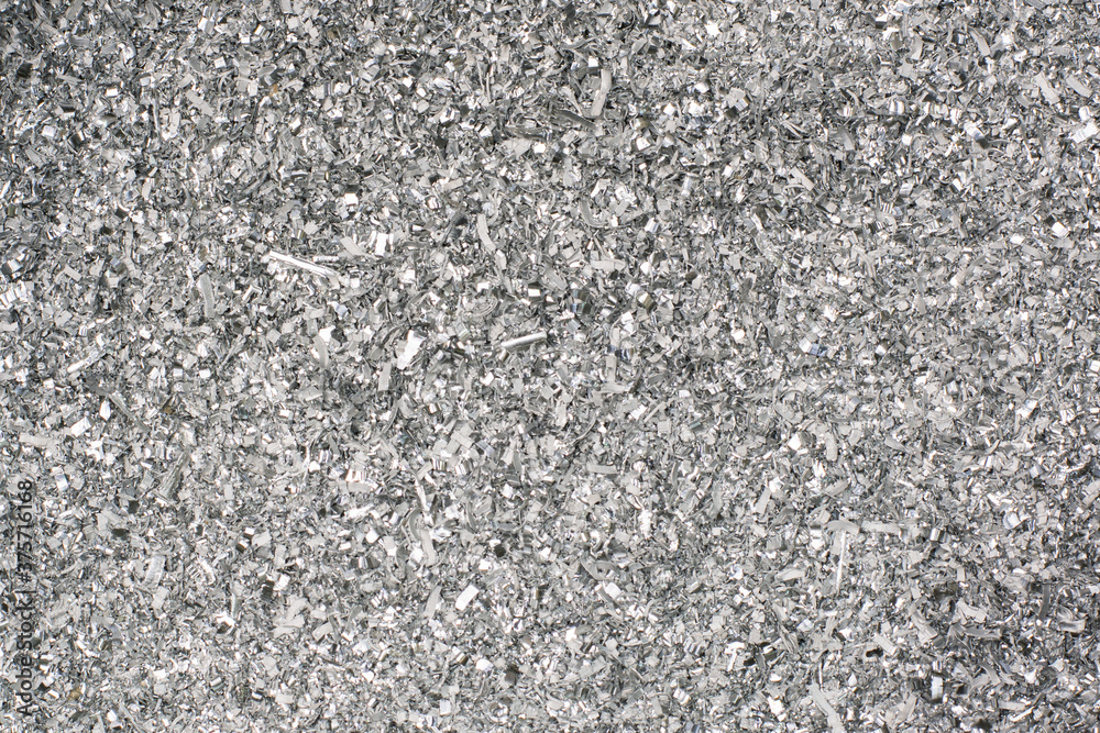 Abstract background and texture of metal shavings. Aluminum chip waste ...