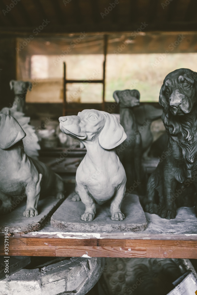 Terracotta Statue of a Basset Dog in a Ceramics Studio Stock Photo ...