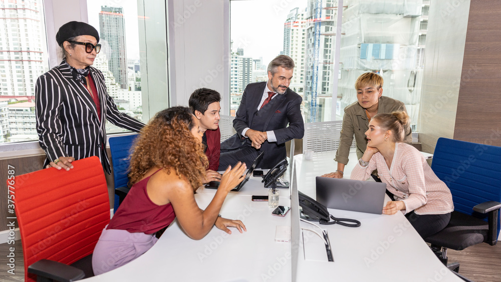 Diverse ethnicities in a business office. Workers from different races ...
