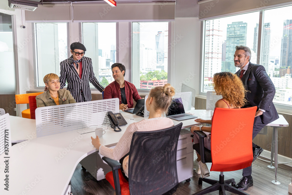 Diverse ethnicities in a business office. Workers from different races ...