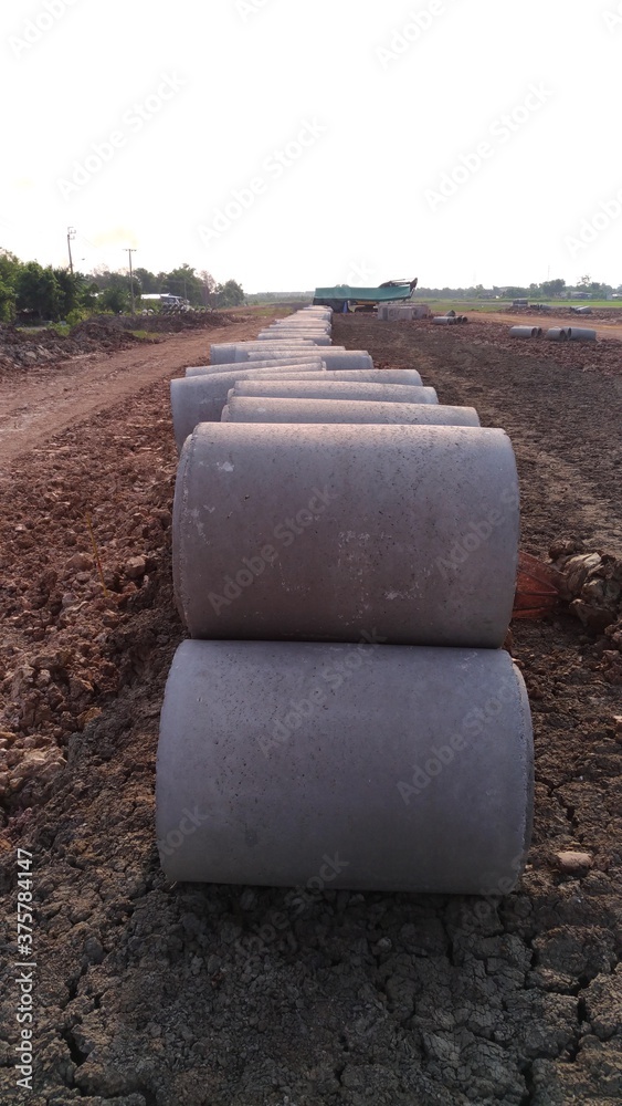 Concrete drainage pipes.Construction of main water supply pipeline ...
