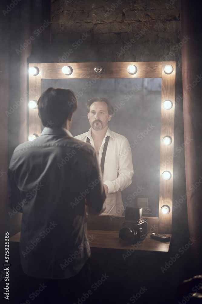 cinematic photo shoot of the confident actor celebrity look in foggy ...