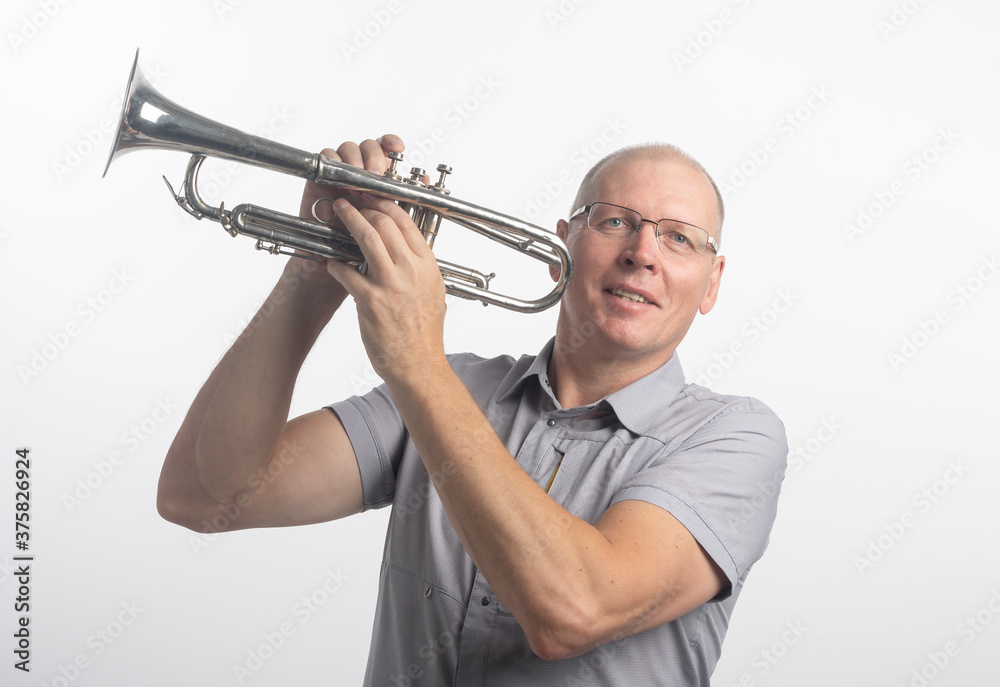 adult senior man playing the trumpet isolated on white background Stock ...