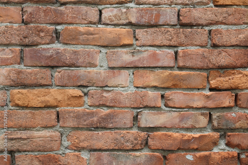 parete di mattoni rossi orizzontali cementati Stock Photo | Adobe Stock