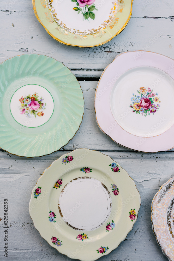 overhead of vintage plates with floral patterns Stock Photo | Adobe Stock