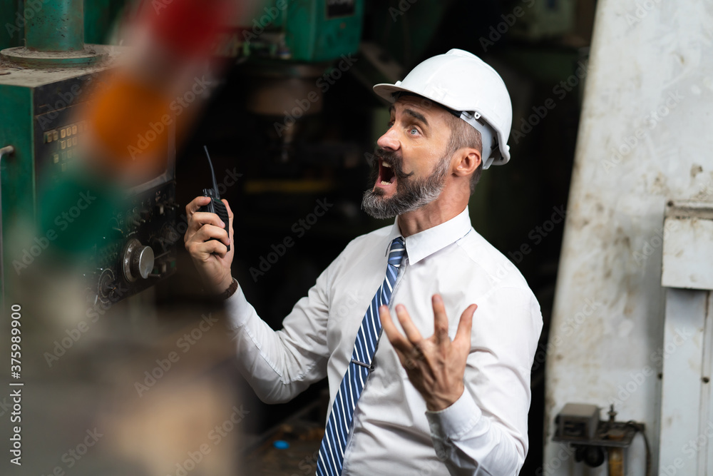 Angry engineer construction worker because machines have frequent ...