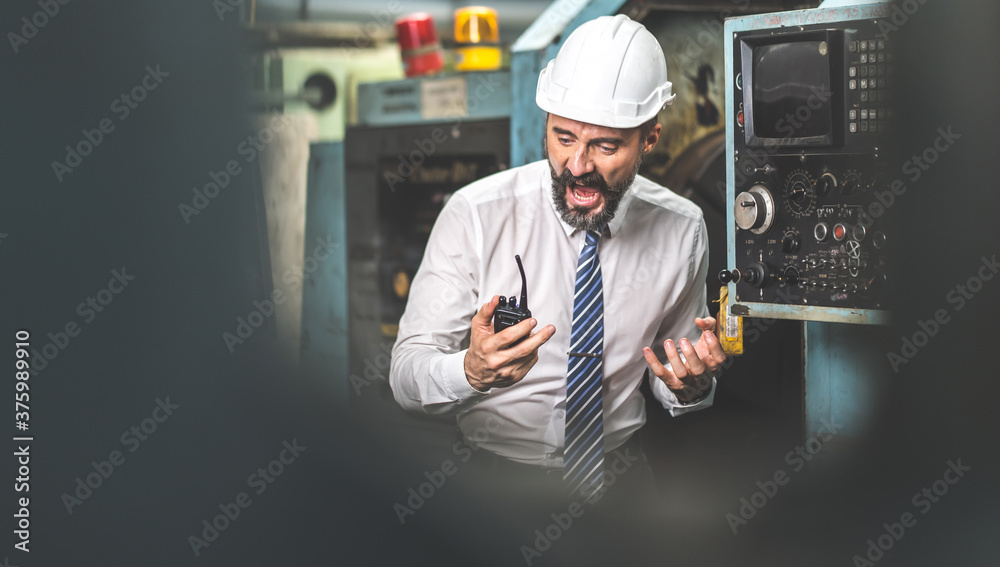 Angry engineer construction worker because machines have frequent ...
