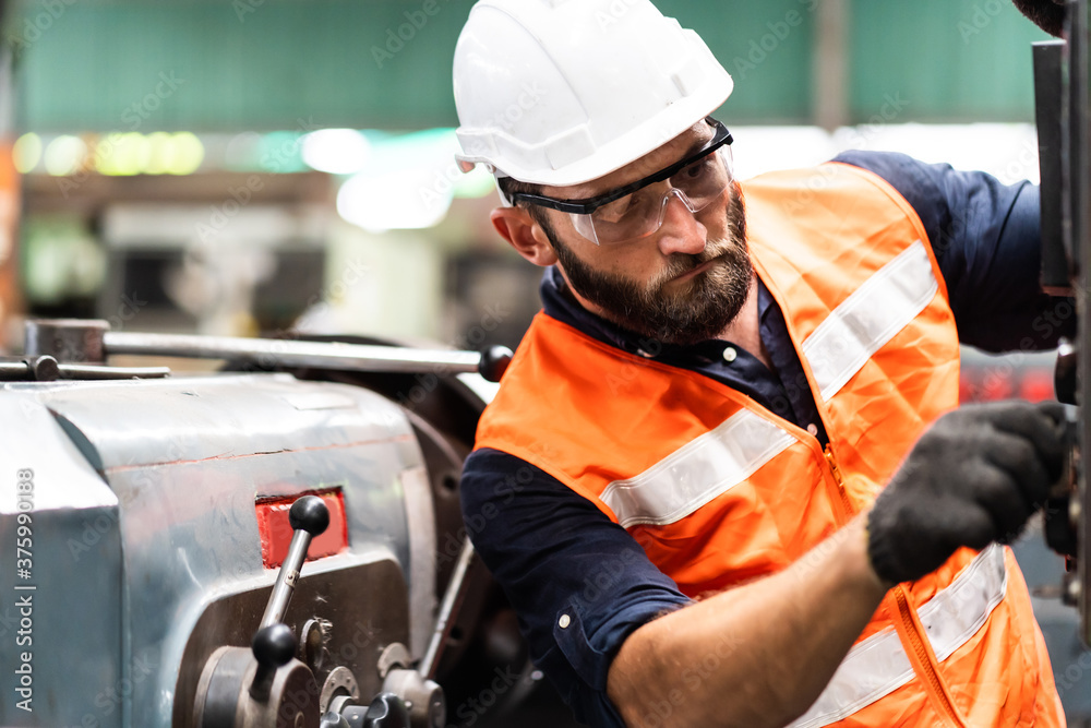 Man at work. Mechanical Engineer man in Hard Hat Wearing Safety Jacket ...