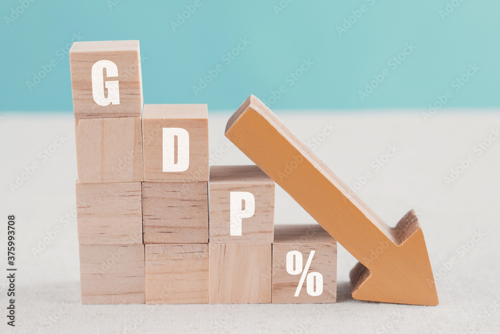 Wooden blocks with GDP% and orange down arrow, impacts of Covid-19 ...