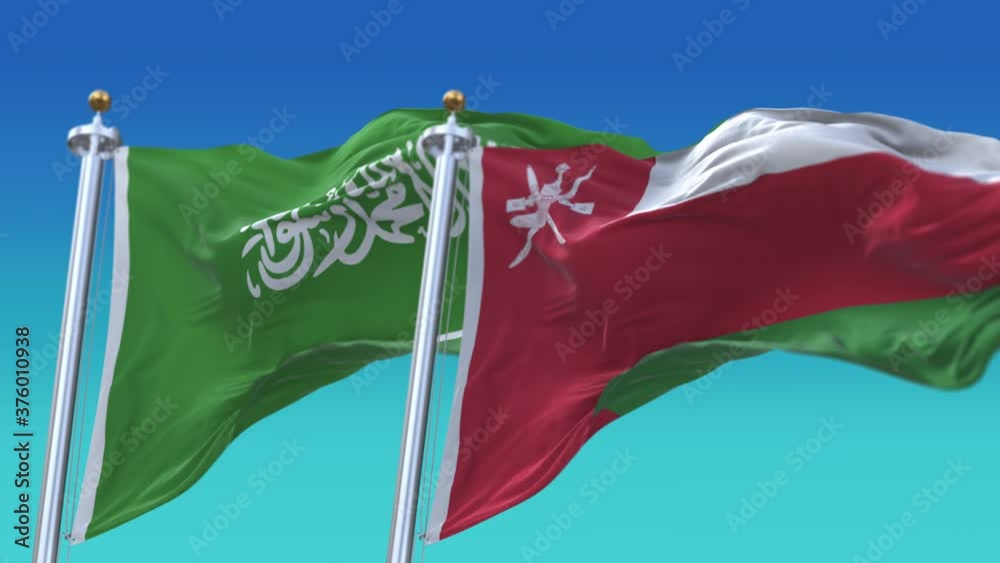 Vidéo Stock 4k Seamless Oman and Saudi Arabia Flags with blue sky ...