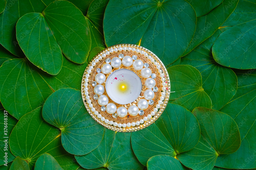 Indian festival dussehra , green leaf ,flowers and lamp Stock Photo ...