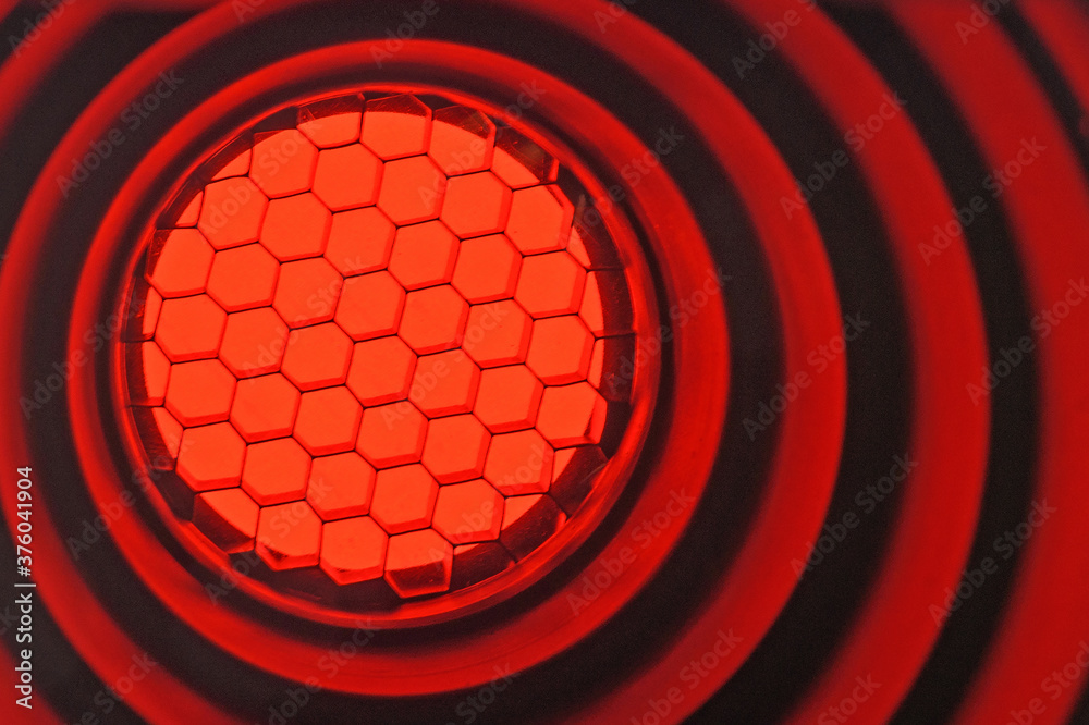 Grid with a red filter of the conical nozzle on the flash close-up ...