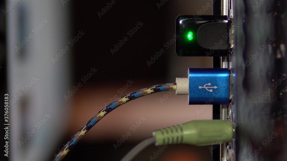 yusb modem wifi inserted into the computer close-up. The modem flashes ...