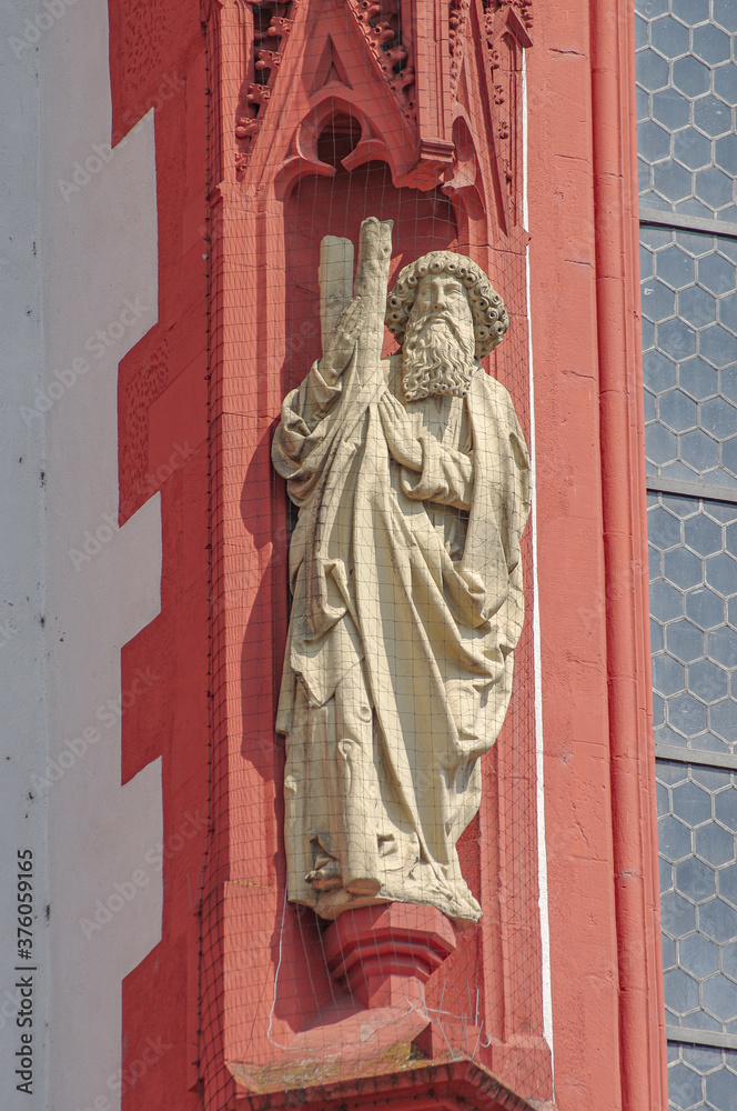 Ancient wall sculpture of a monk at the main facade of Mary chapel in ...