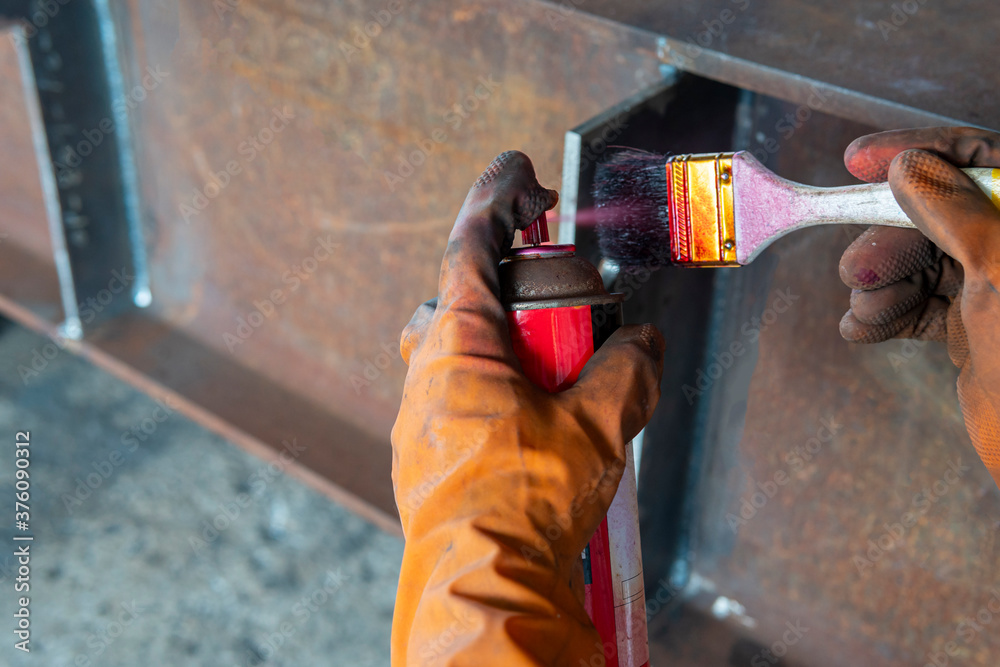The step two of doing penetrant testing is step to use spray Liquid ...