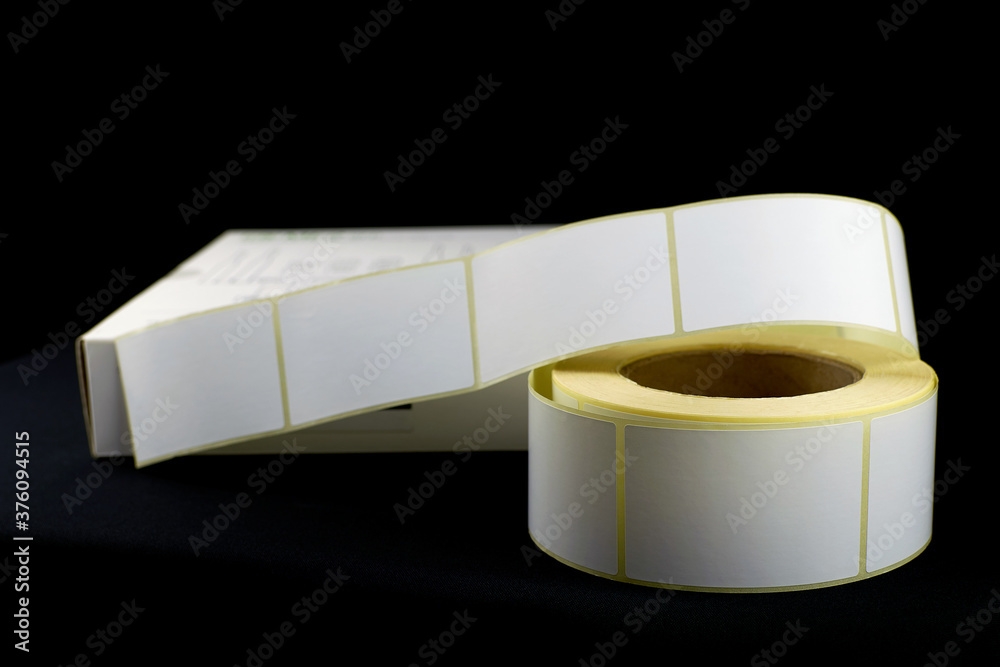 Roll of labels for thermal perforation on a white box.Stickers for ...