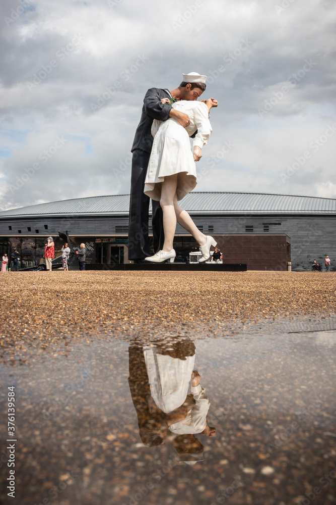 A statue of a sailor kissing a girl located in Portsmouth dockyard ...